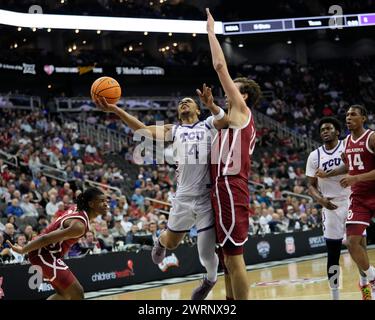 Oklahoma forward Sam Godwin (10) rebounds the ball past Alabama center ...