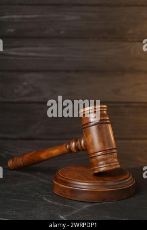 Wooden gavel on dark textured table, top view Stock Photo - Alamy