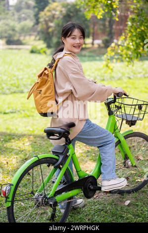 Young university student campus cycling Stock Photo - Alamy