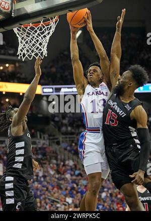 MAR 13 2024: Kansas Jayhawks forward K.J. Adams Jr. (24) slams the ball ...