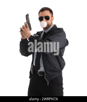 Male police officer blowing bubble gum on white background Stock Photo ...