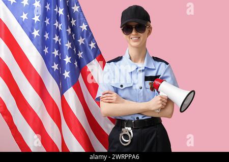 Female police officer with megaphone and flag of EU on white brick ...