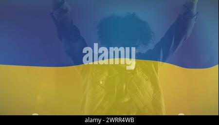 Image of flag of ukraine over african american male protester Stock ...
