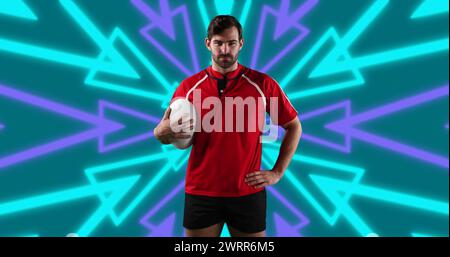 Caucasian male american football player holding ball with neon pink ...