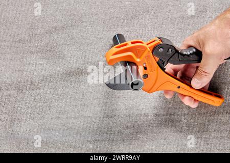 Using pipe cutter with ratcheting mechanism when installing sprinkler ...