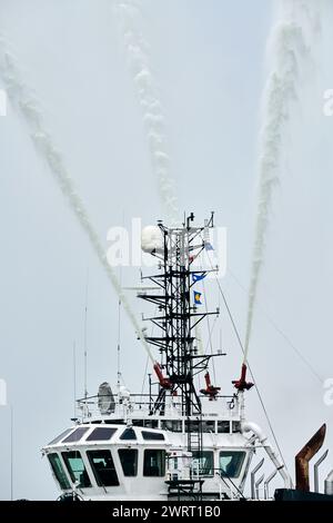 Fireboat water salute close up view, fireboat directing jets of water ...