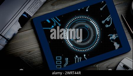 Image of motherboard and circular scanner processing data on screen of ...