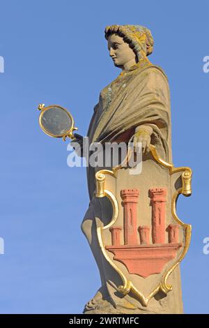 Patron saint Minerva with hand mirror and city coat of arms as shield ...