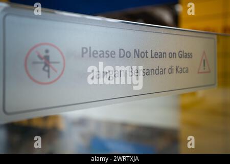 "Please Do Not Lean Against Glass" sticker on the glass railing Stock ...