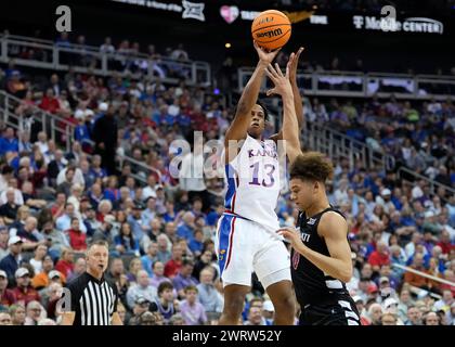 Kansas guard Elmarko Jackson shoots during the first half of an NCAA ...