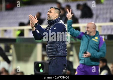 Maccabi Haifa head coach Daniel Seoane talks with players before an ...