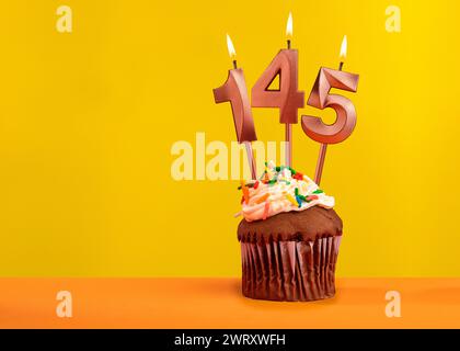 Golden candle 145 with flame - Birthday card on dark luxury background ...