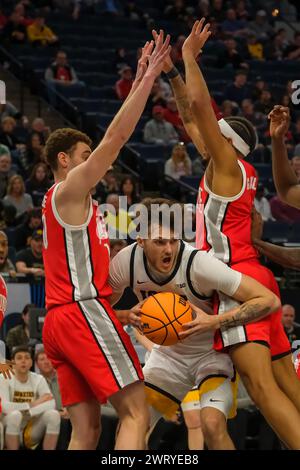 Iowa forward Owen Freeman (32) celebrates with teammate guard Tony ...