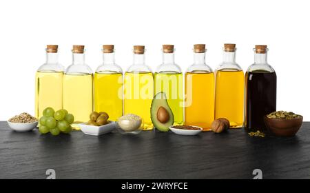 Vegetable fats. Bottles of different cooking oils and ingredients on ...