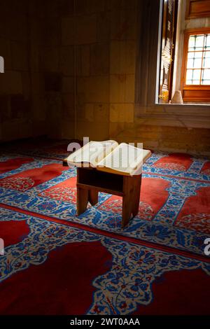 Islamic vertical background photo. Holy Quran in the mosque at sunset ...