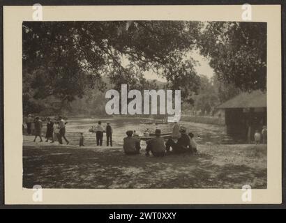 Figures and Photographer in Park. Louis Fleckenstein, photographer ...