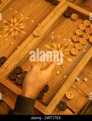 A top view of people playing backgammon Stock Photo - Alamy
