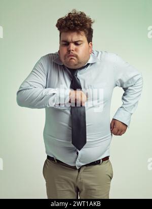 Plus size, sick and man with vomit, abdomen and unhealthy with double ...