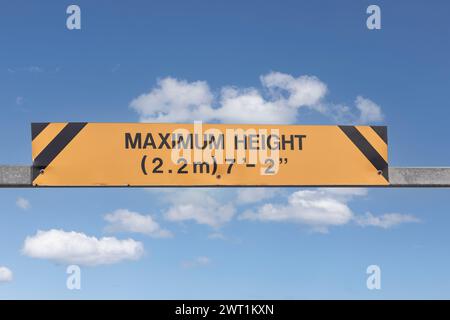 A yellow Maximum Height warning sign Stock Photo - Alamy