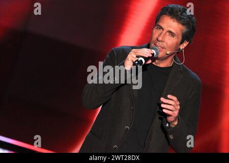 Luca Barbarossa performs live at the RAI studios in Naples Stock Photo ...