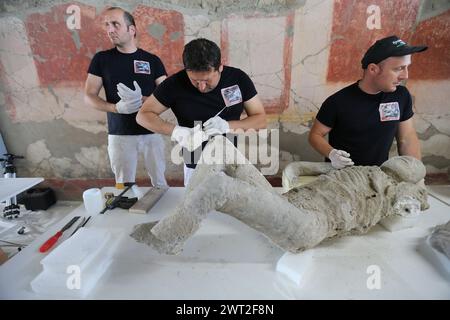 One of the plaster casts in the excavations of Pompeii. The casts of ...