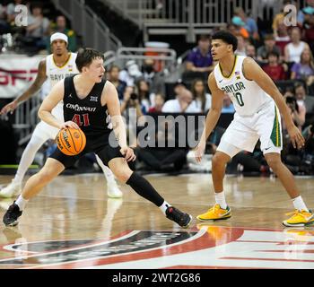 Cincinnati guard Simas Lukosius (41) puts up a shot under pressure from ...