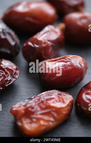 Dried dates are laid out slate board Stock Photo - Alamy