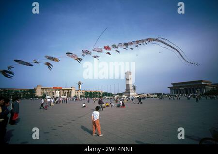 Man flying long kite, taken in 1995, Tiananmen Square, Beijing, China ...