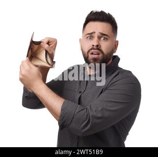 Upset man showing empty wallet on white background Stock Photo - Alamy
