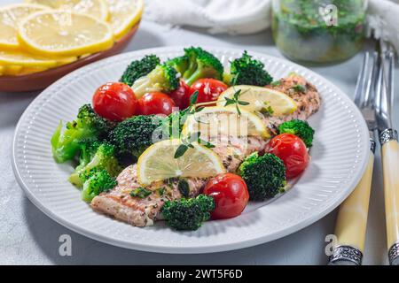 Baked salmon steak with broccoli Stock Photo - Alamy