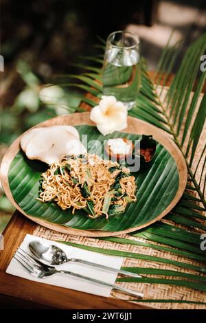fried noodles with chilli on wood table Stock Photo - Alamy