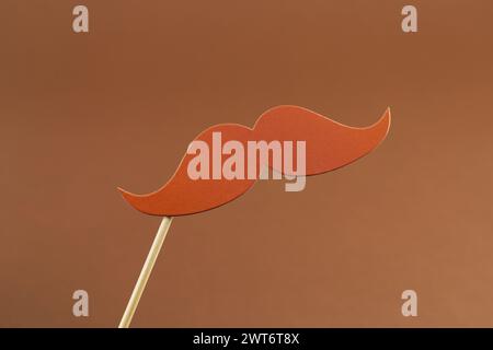 Fake paper mustache party prop against white background Stock Photo - Alamy