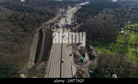 Workman on the section of the M25 between Junctions 10 and 11, in ...