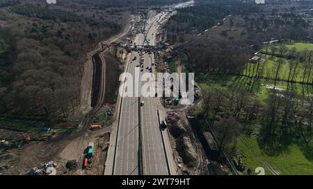 Workman on the section of the M25 between Junctions 10 and 11, in ...