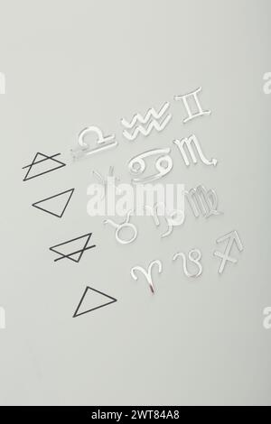 Zodiac triplicity. Four elements and corresponding signs on grey ...