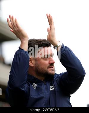 AFC Wimbledon's Manager Johnnie Jackson applauding the fans at full ...