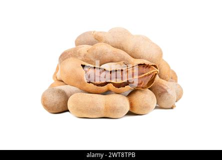 Bunch of tamarind fruits in shell on white background Stock Photo - Alamy