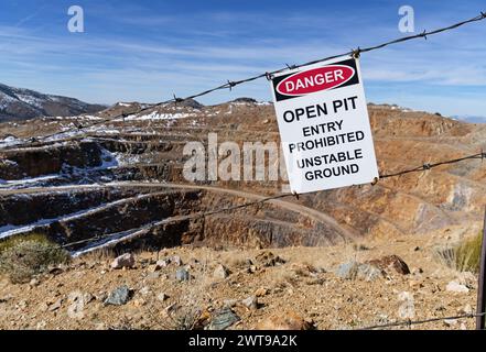 danger unstable ground sign on a metal fence Stock Photo - Alamy