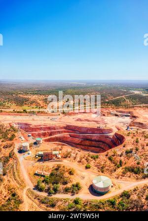 Bottom of open pit copper mine in Cobar town of Australa - aerial top ...