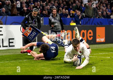 England's Tommy Freeman scores their side's third try of the game ...