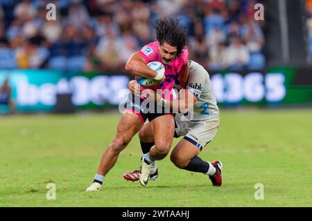 Charlie Gamble of the Waratahs is tackled during the tour match between ...
