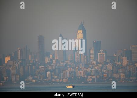 Smog and pollution on a sunnyy day amongst the skyscrapers and modern ...