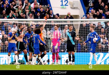 Leicester City's Callum Doyle is shown a red card by referee Andrew ...