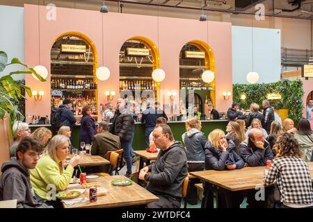 People eating and drinking in Chester Market food hall outlet Stock ...
