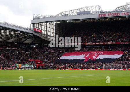 Manchester United fans unveil a banner in protest of increased matchday ...