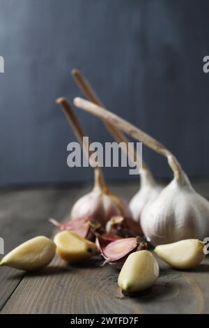 Garlic cloves on cement background, close-up Stock Photo - Alamy