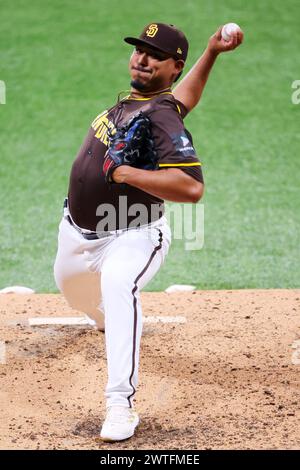 San Diego Padres' Jeremiah Estrada follows through on a pitch against ...