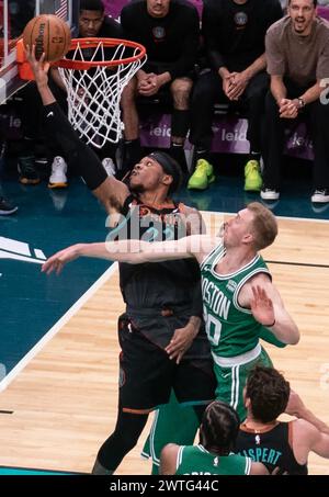 Boston Celtics forward Sam Hauser (30) drives to the basket against ...