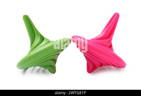 Green and pink spinning tops isolated on white Stock Photo - Alamy