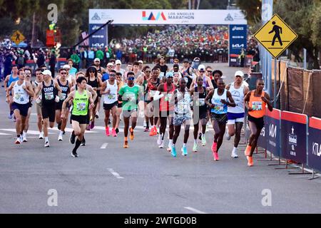 Runners head out from the starting line of the 125th Boston Marathon ...